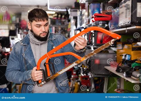 Portrait Adult Male With Hacksaw In Tools Store Stock Image Image Of