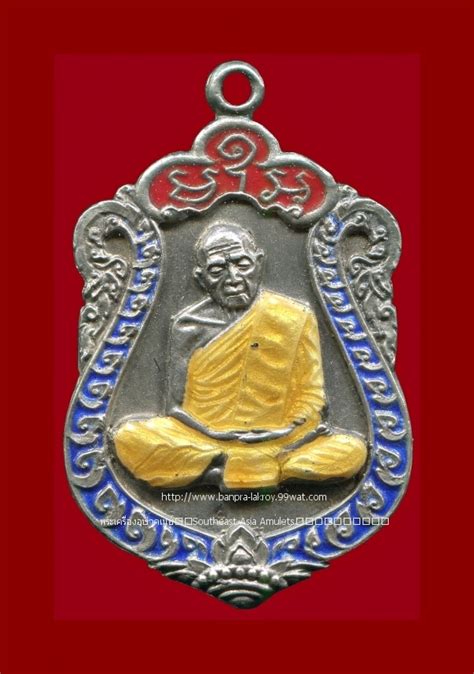หลวงปู่ทิม วัดละหารไร่ เหรียญเสมา 8 รอบ เนื้อเงินฉลุ โค๊ตเม็ดงาตัว นะ ใต้สังฆาฏิ ลงยา 3 สี ปี