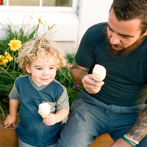 Father And Son Eating Ice Cream By Stocksy Contributor Maria Manco Stocksy