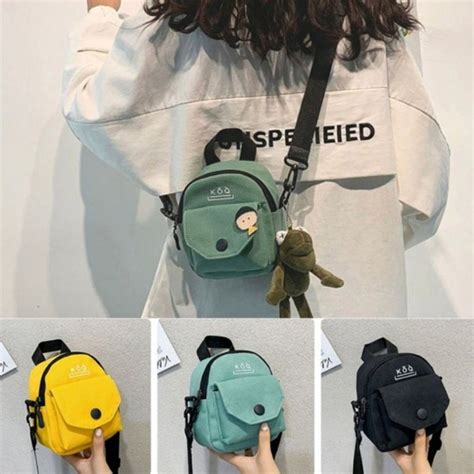 유투미월드 ♥당일 출고♥ 아담한 사이즈 톡특한 문양 로고 미니 보조 크로스백 Up