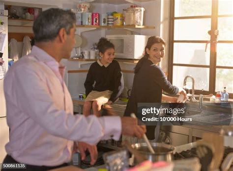Indian Couple In Kitchen Photos And Premium High Res Pictures Getty