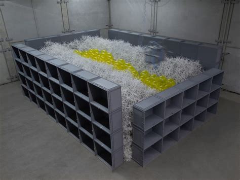 Robots Built Cave Like Pavilion From 120 000 Interlocking Spikes And Balls