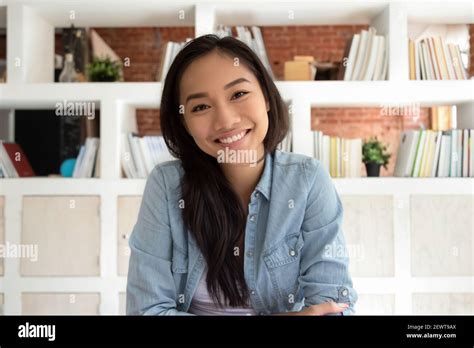 Smiling Asian Young Woman Looking At Webcam Making Video Call Stock