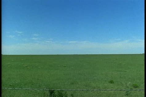 Flat Grassy Plain And Big Blue Sky In Oklahoma Panhandle Oklahoma Stock Footage Video 4349753