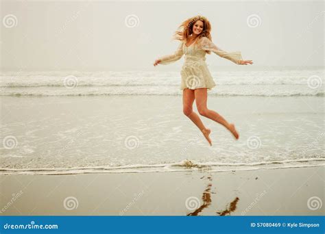 Teen Girl Jumping In The Waves Stock Image Image Of Fashion Beach