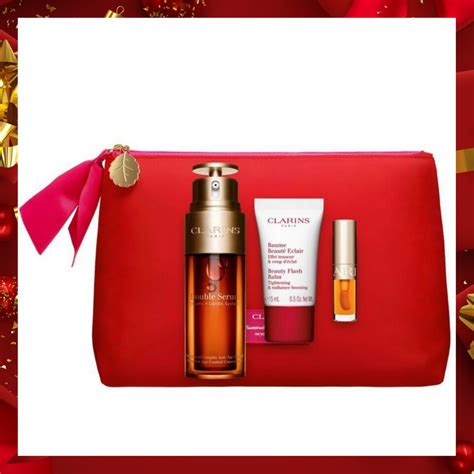 实力御龄维稳！clarins 娇韵诗黄金双萃精华套装总价值高达145欧，现折上折低至62欧！立收精华50ml 美颜霜15ml 唇部精油2 5ml！ 德淘网