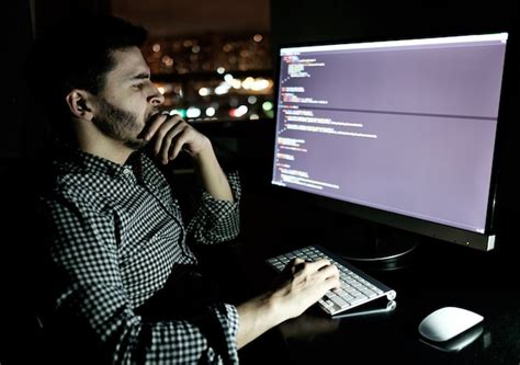 Premium Photo Software Developer Computer At Dark Home Office