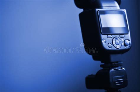 Speedlight Gun With Trigger Set Mounted On Tripod Phantom Classic Blue Color Tone Stock Image