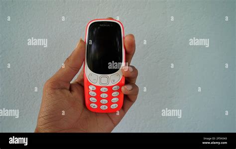 Rajasthan India March A Man Holding Nokia Keypad Mobile Model With Black