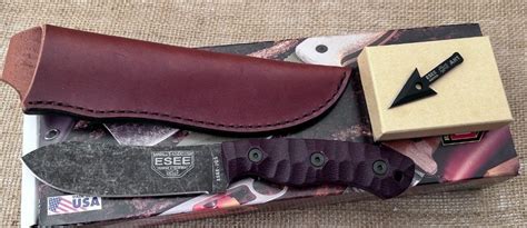 Esee Rowan And An Arrowhead