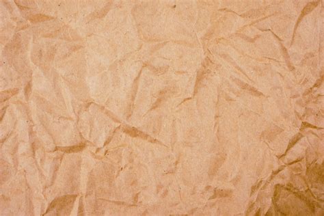 배경 오래 된 갈색 구겨진 종이 텍스처 프리미엄 사진