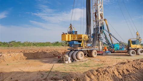 A Drilling Rig Set Up In A Rural Area Extracting Core Samples From Deep Underground Premium Ai