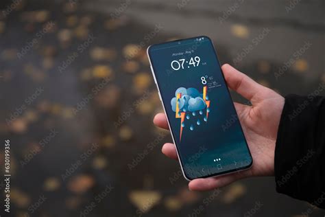 Woman Checking Weather Using App On Smartphone On Street Closeup Data And Illustration Of