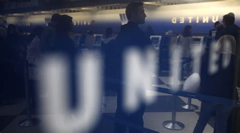 Video A United Airlines Passenger Is Violently Dragged Off An