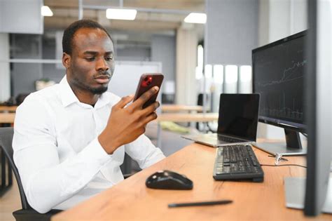 Premium Photo Stock Market Day Trader Working On Computer With Multimonitor Workstation With