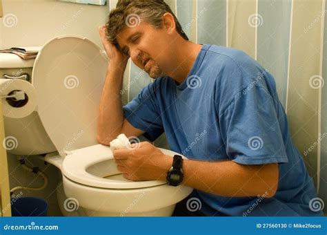 Very Sick Man Throwing Up At The Toilet Stock Photo Image Of Horizontal Stomach 27560130