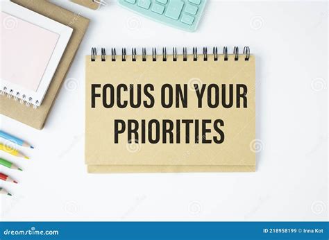 SET UP YOUR PRIORITIES Written On White Paper On A Light Brown Background Stock Photography