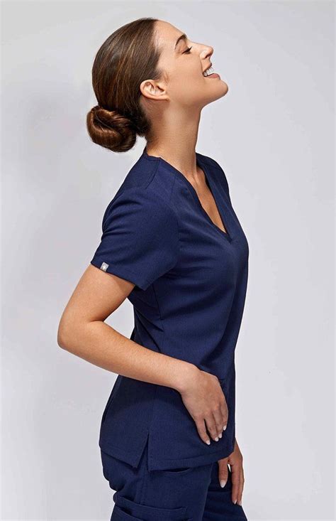 With Stretch Fabric And Three Pockets The Womens Casma Scrub Top Is Ready For