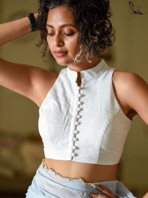 Cotton White Sleeveless Blouse With High Neck Code White Suta