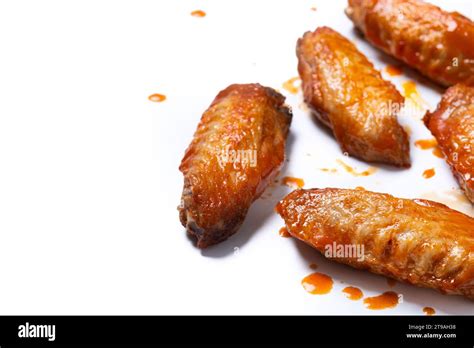 Buffalo Spicy Chicken Wings With Cayenne Pepper Sauce Isolated On White