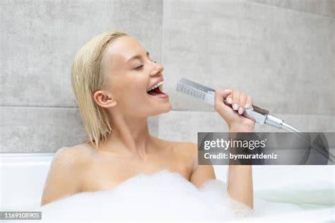 Sing Shower Photos And Premium High Res Pictures Getty Images