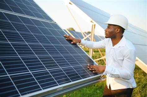 Premium Photo Photovoltaic Green Energy Technology Worker At Solar Panel Plant