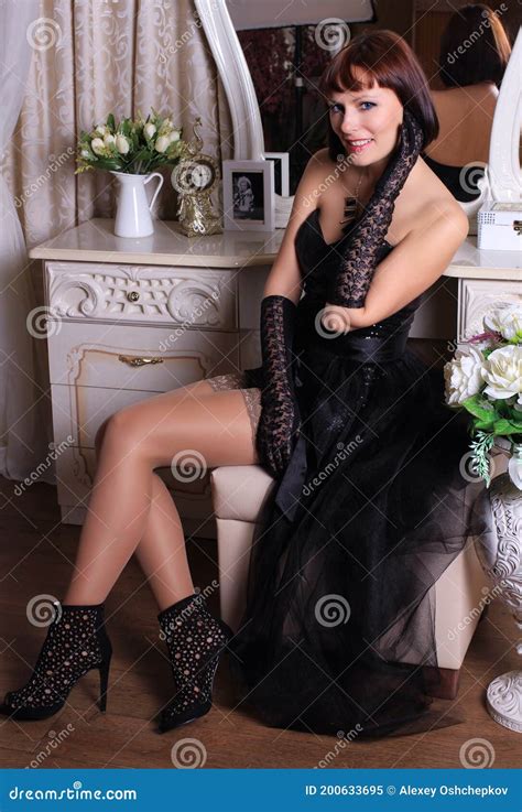 Redhead Model In Stockings And Black Minidress Stock Image Image Of Perfect Minidres 200633695