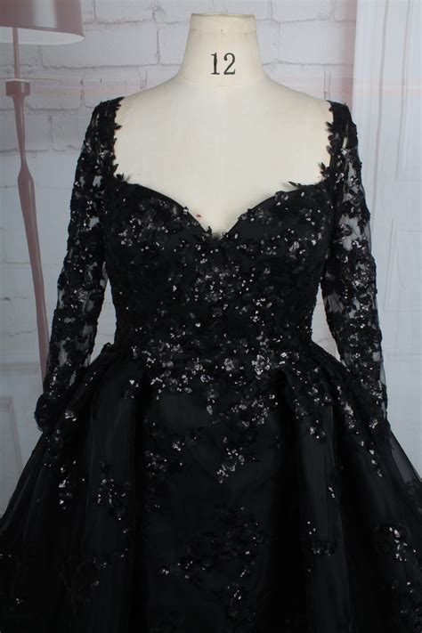 Black Plus Size Long Sleeve Ball Gown From Darius Cordell