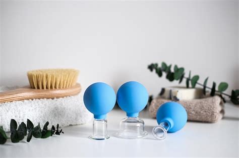 Premium Photo Glass Jars For Massage Lie On The Background Of Spa
