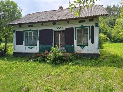 ½ частина житлового будинку з господарською будівлею загальною площею 59 3 м кв житловою