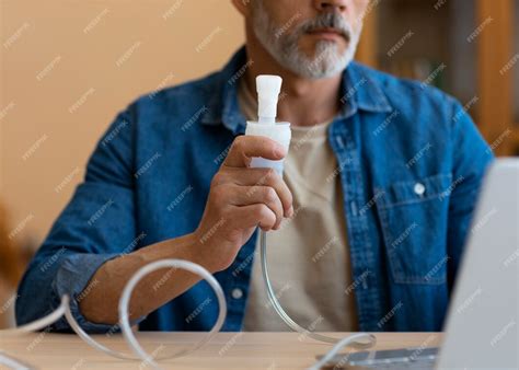 Free Photo Front View Man Using Nebulizer