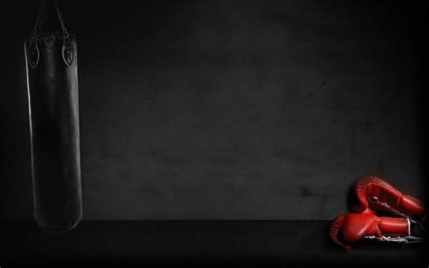 Download Boxing Gloves And Punching Bag Wallpaper