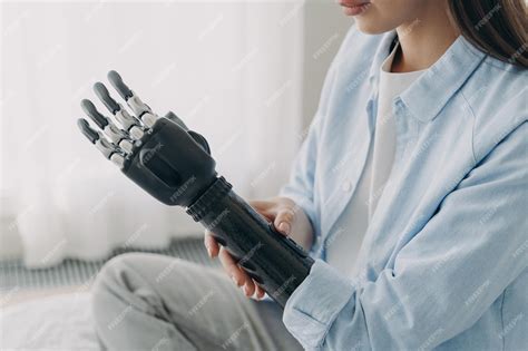 Premium Photo Application Of Bionic Hands Disabled Woman Customizing