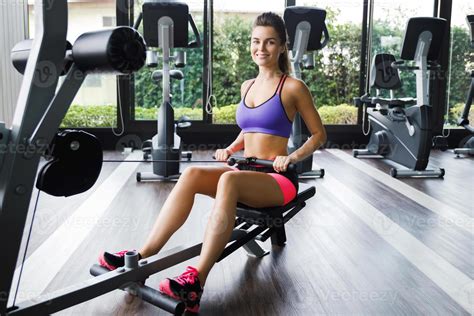 Woman Doing Exercise For Her Back Seated Cable Row 16199179 Stock Photo At Vecteezy