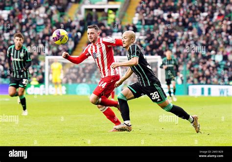 Celtics Daizen Maeda Right And St Johnstones Drey Wright Battle For