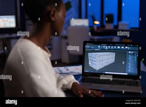 African American Design Arhitect Working In 3d Software Developing Prototype Container Idea