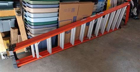 Werner Orange Fiberglass 12 Ft Step Ladder Mark Van Hook Auctioneer
