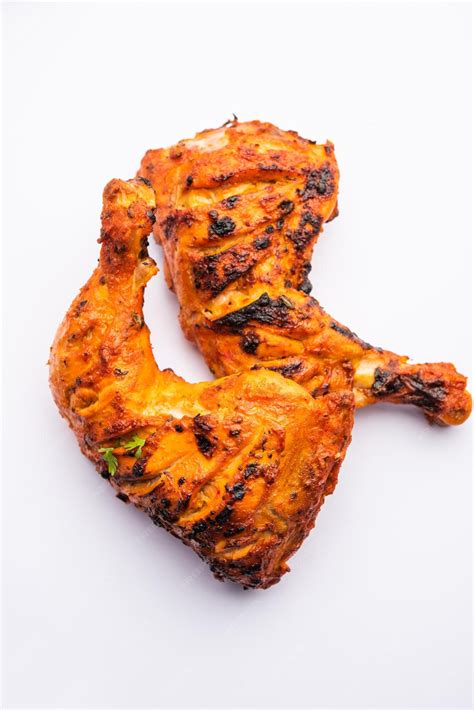 탄두리 치킨은 인도의 비채식 매운 음식입니다 프리미엄 사진