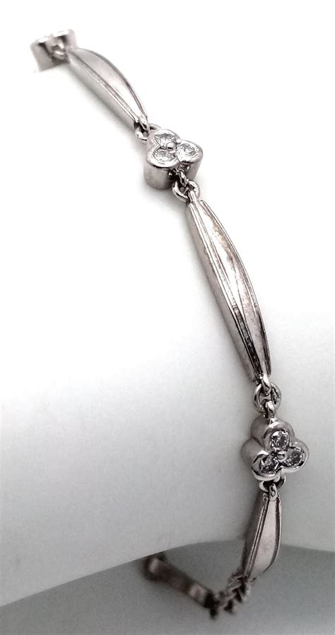 Sold At Auction A 18k White Gold Diamond Clover Bracelet