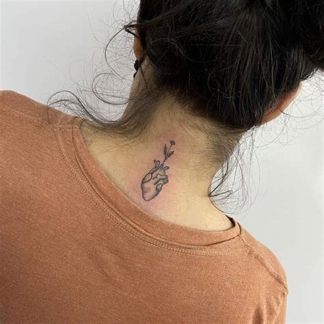Aggregate 94 About Small Back Of Neck Tattoos Latest Billwildforcongress