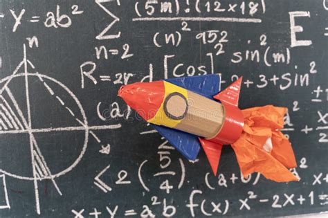 Handmade Rocket On Blackboard With Math And Science Formulas For Creative Education Learning