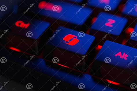 Copilot Ai Logo On A Black Computer Keyboard With Red Backlight Close