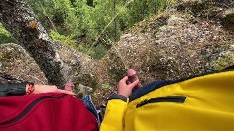 Two Tight Streams Of Urine Cross In The Mountains Pissing Outdoor Uhd