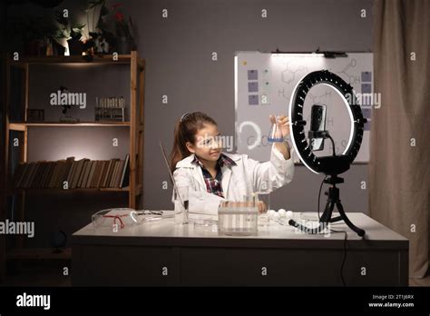 Chemistry Research Babegirl Holding Chemical Flask In Hands And Showing It On Camera