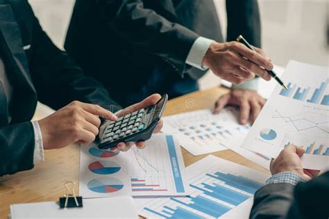 Business Team Analyzing Data Using Computer While Spending Time In Office Financial Planning