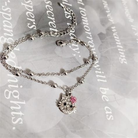 خرید و قیمت دستبند دخترانه کیتی طرح زنجیری رنگ ثابت از غرفه جنوب پرفیوم