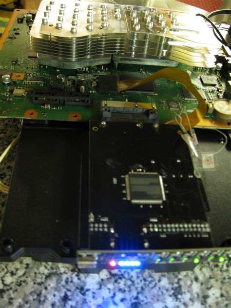 File E3 Flasher Working On Open Ps3 Dia 002 With Heatsink  Ps3 Developer Wiki