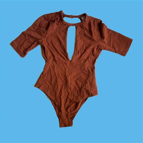 Rust Colored Body Suit With Low Cut And Open Back Depop