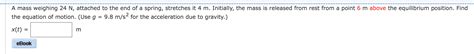 Solved A Mass Weighing 24 N Attached To The End Of A