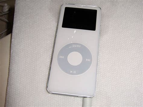How To Turn Off Ipod Nano Now Press And Hold The Menu And Select Buttons Until The Download